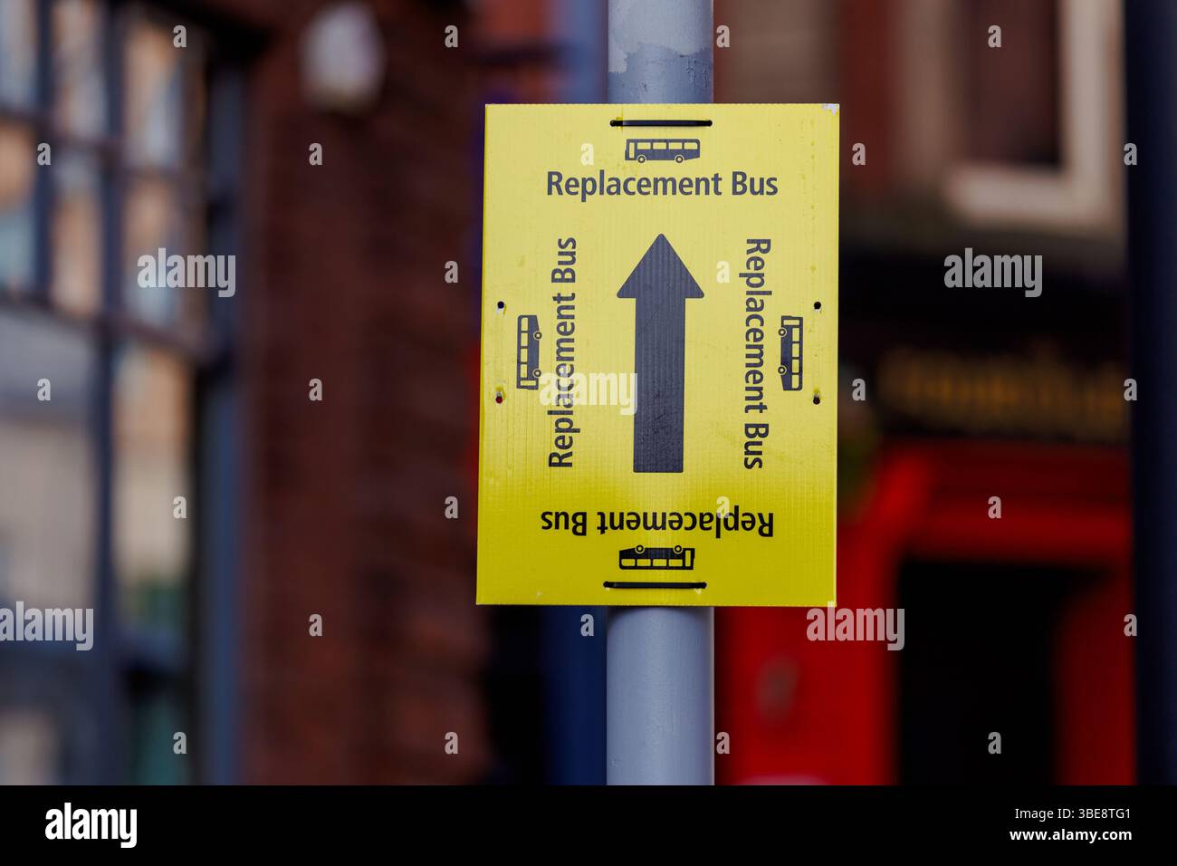 A sign pointing to a replacement bus service, replacement buses ...