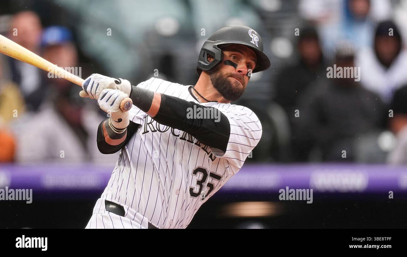 Colorado Rockies designated hitter Nick Martini (35) in the seventh ...