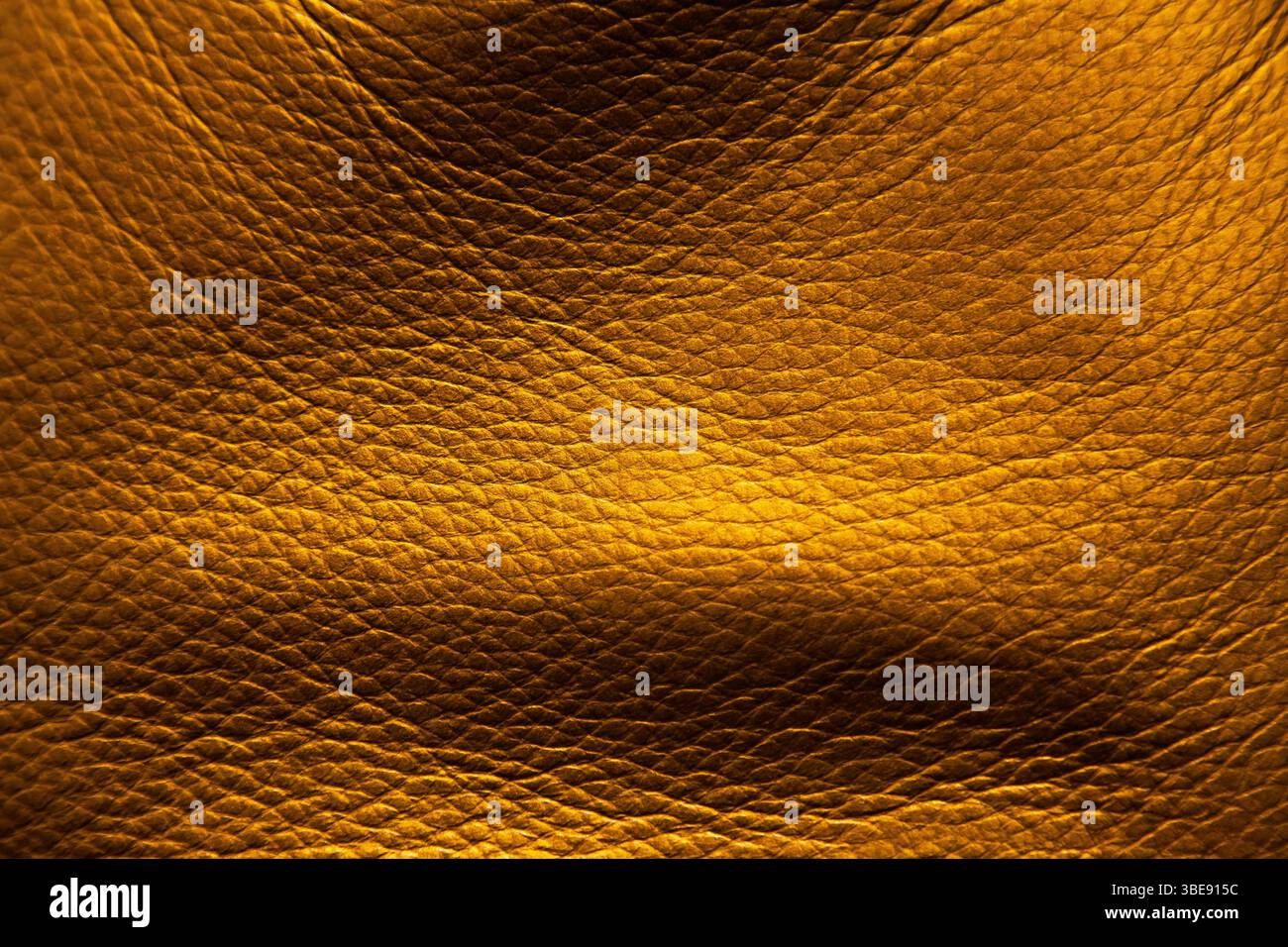 Texture of grainy leather of golden color, close-up Stock Photo - Alamy