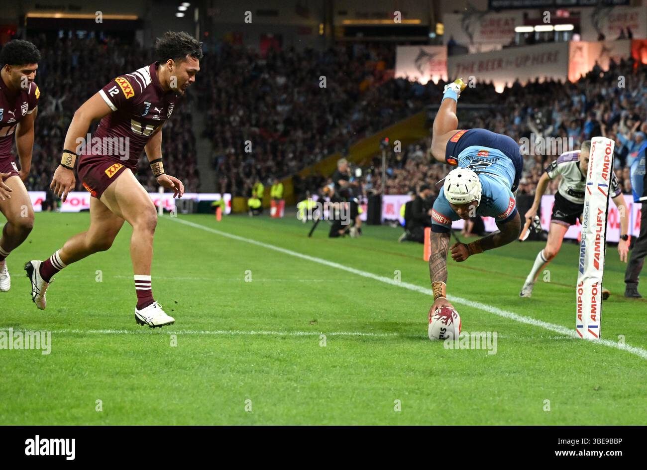 Brisbane, Australia. 28th May, 2025. Brian To'o of the Blues scores a ...