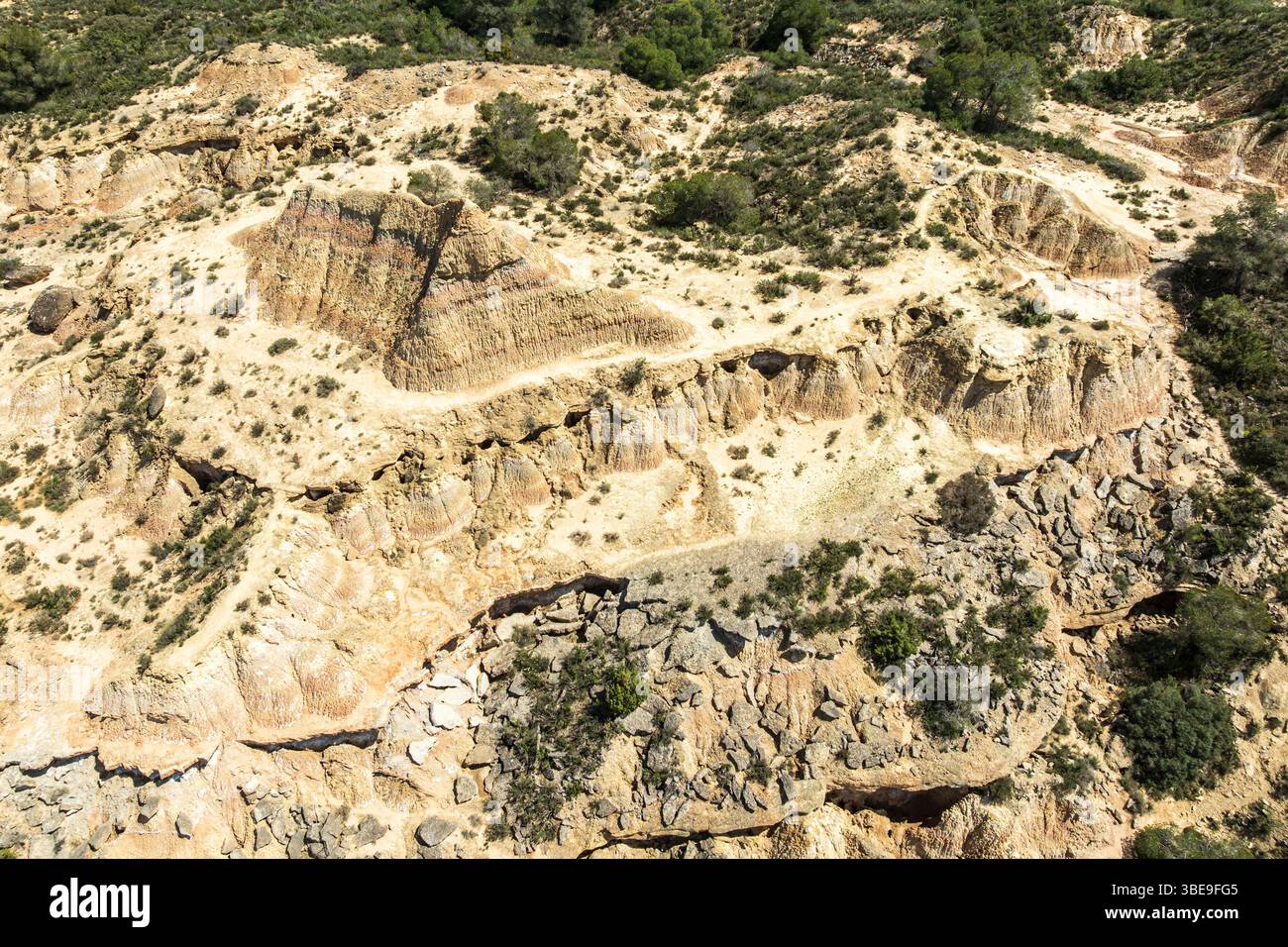 Colorful sandstone rock formations, desert, gravel road Ruta Jubierre ...