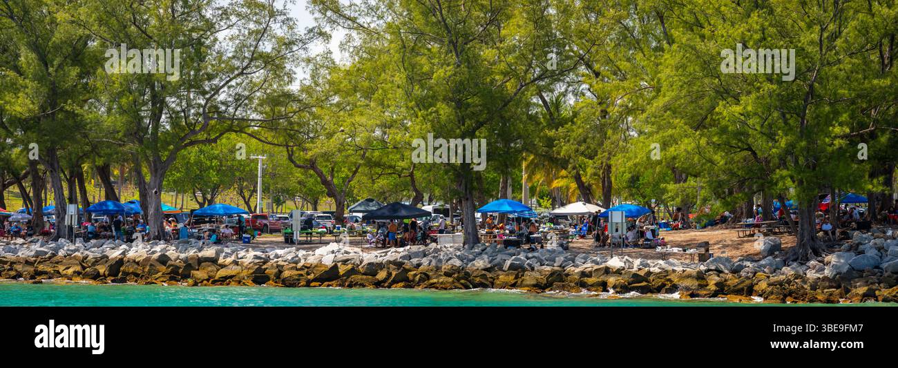 Miami Beach, FL, USA - May 25, 2025: People having picnic at Haulover ...