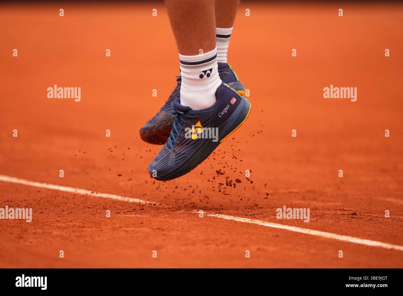 Norway's Casper Ruud kicks the clay as he serves against Portugal's Nuno Borges during their ...