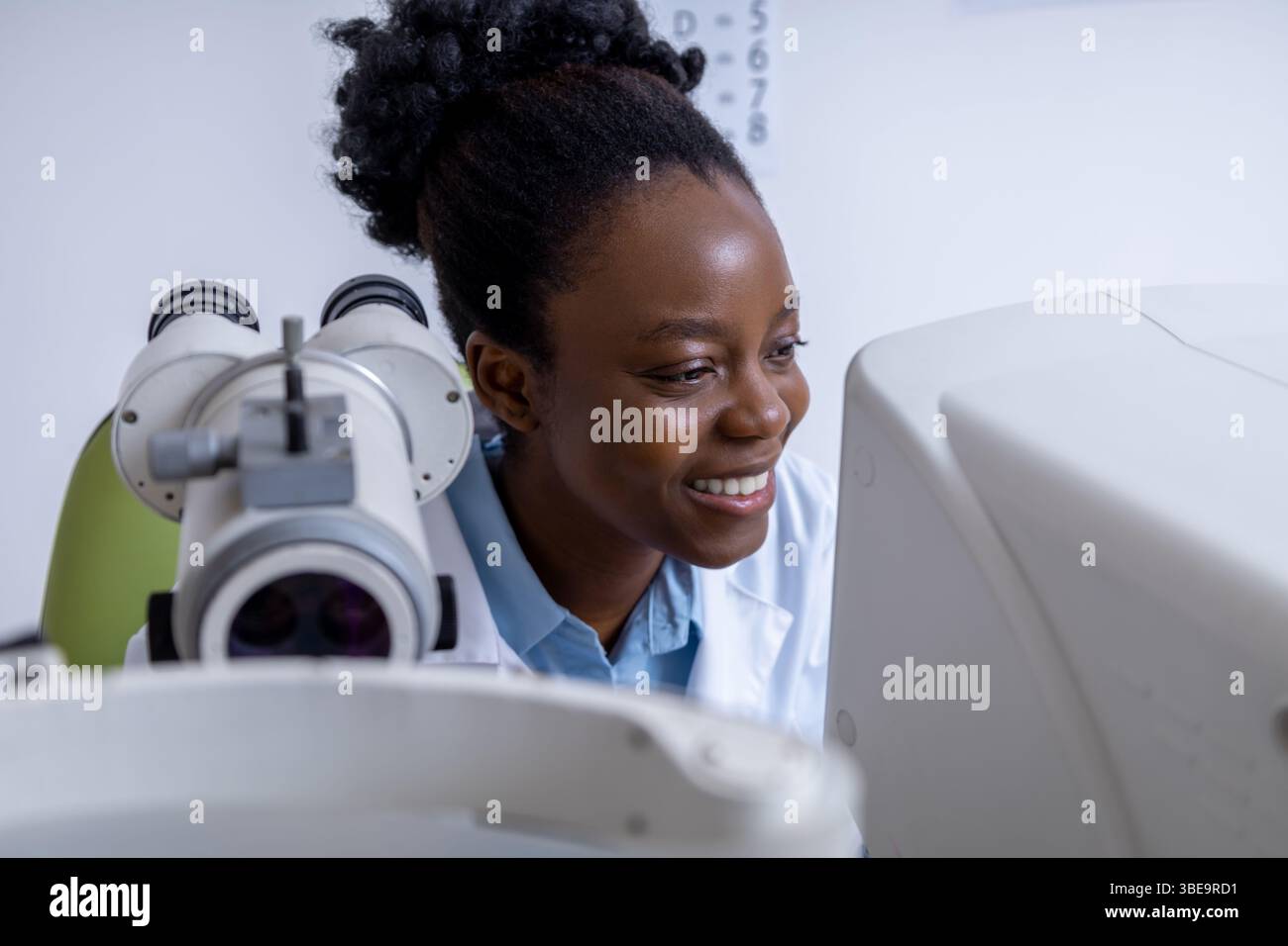 African american ophthalmologist in hi-res stock photography and images ...