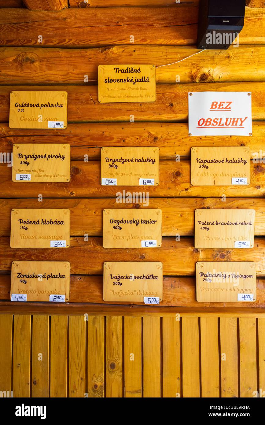 Wooden signs displaying traditional Slovak food and prices in euros ...