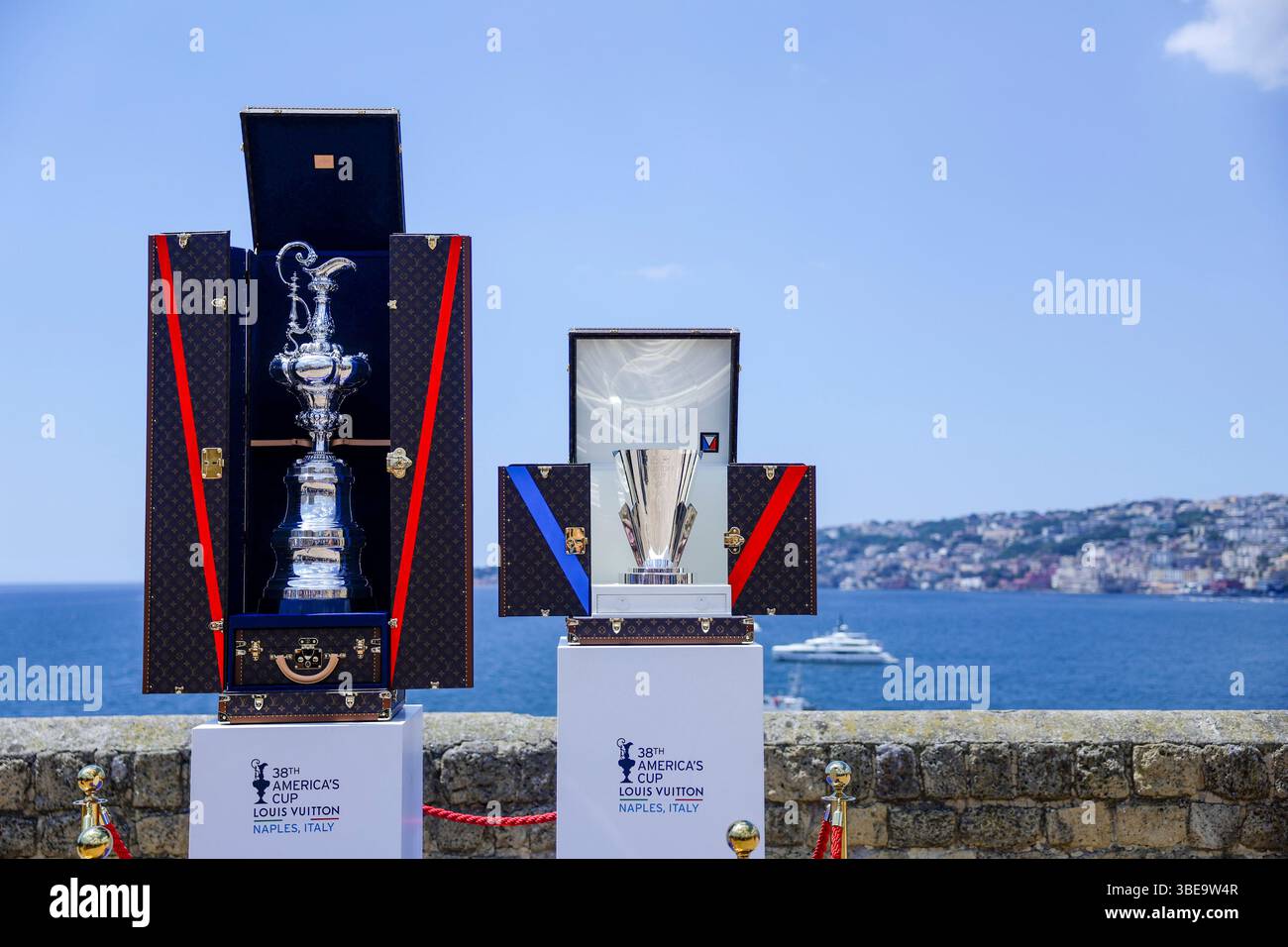 The America's Cup trophy, left, and Louis Vuitton Cup trophies are seen ...