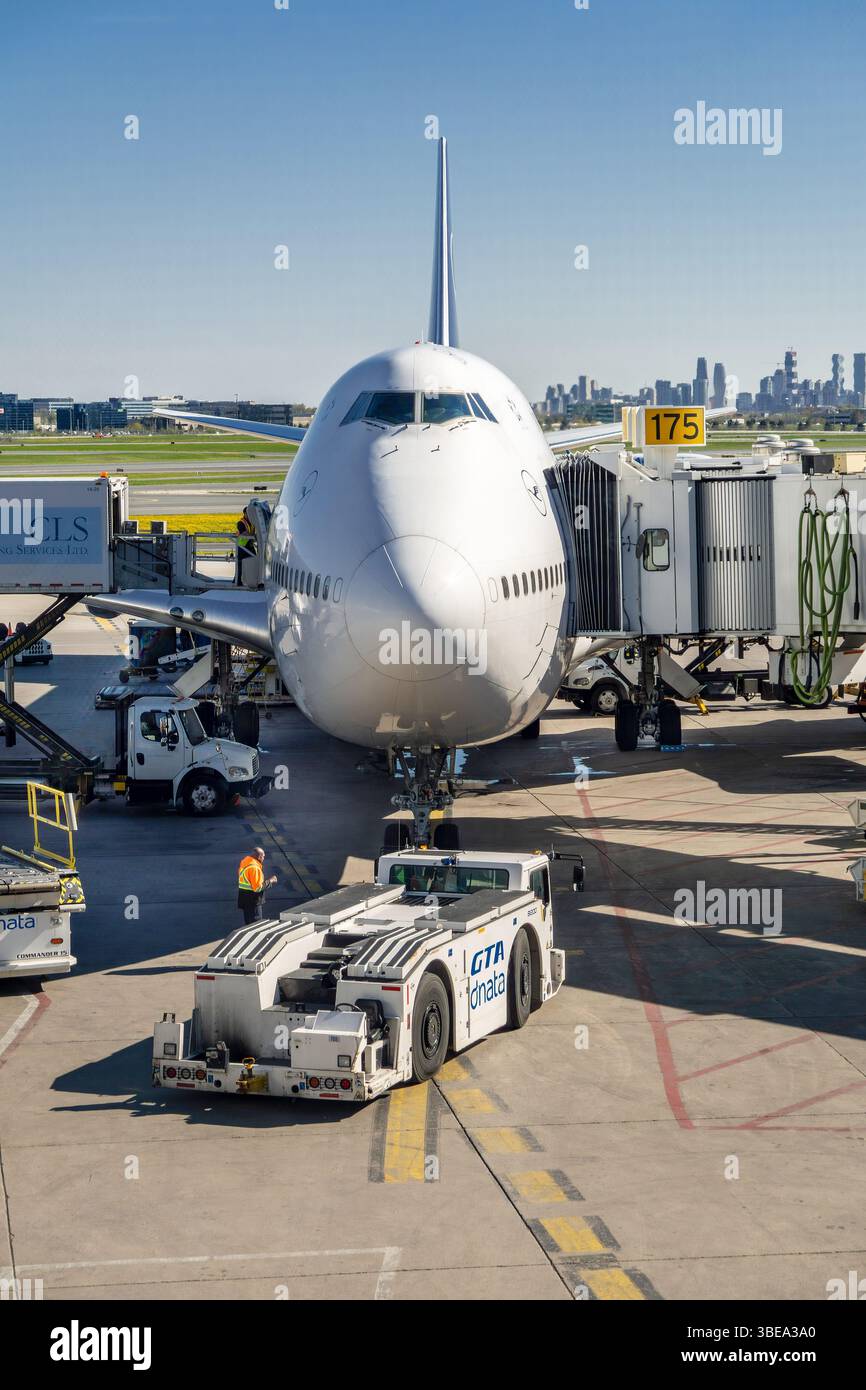 Lufthansa 747-400 Passenger Aircraft Being Loaded At Pearson ...