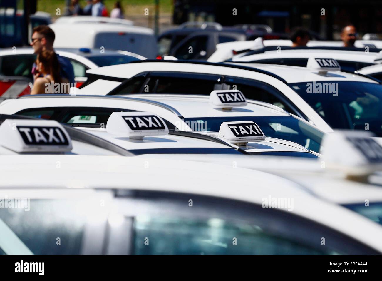 Taxi vehicles are parked during a demonstration and strike against the ...