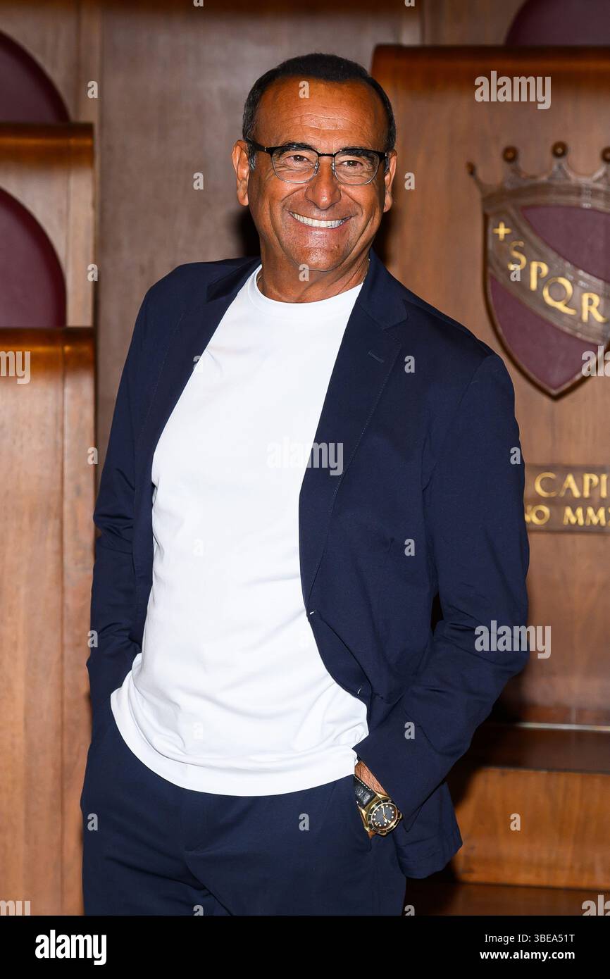 Carlo Conte waiting to attend the press conference to present TIM ...