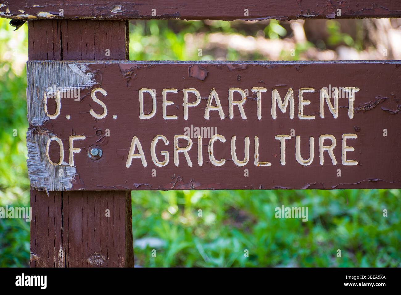 SANTAQUIN CANYON, UTAH, USA – May 27, 2025: A weathered wooden sign ...