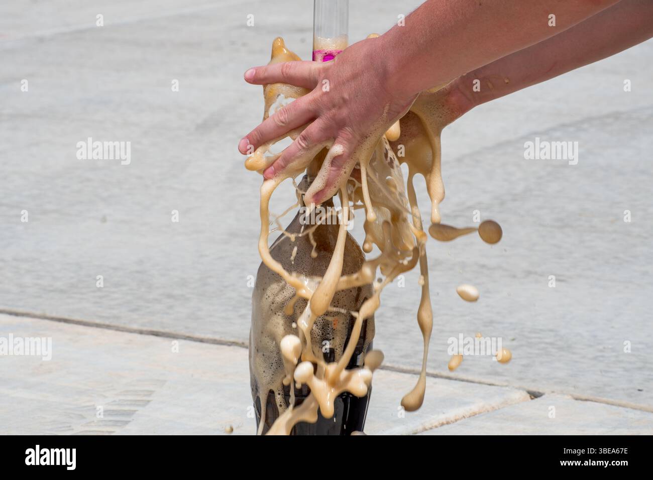 SALT LAKE CITY, UTAH – May 27, 2025: A person triggers a soda eruption ...