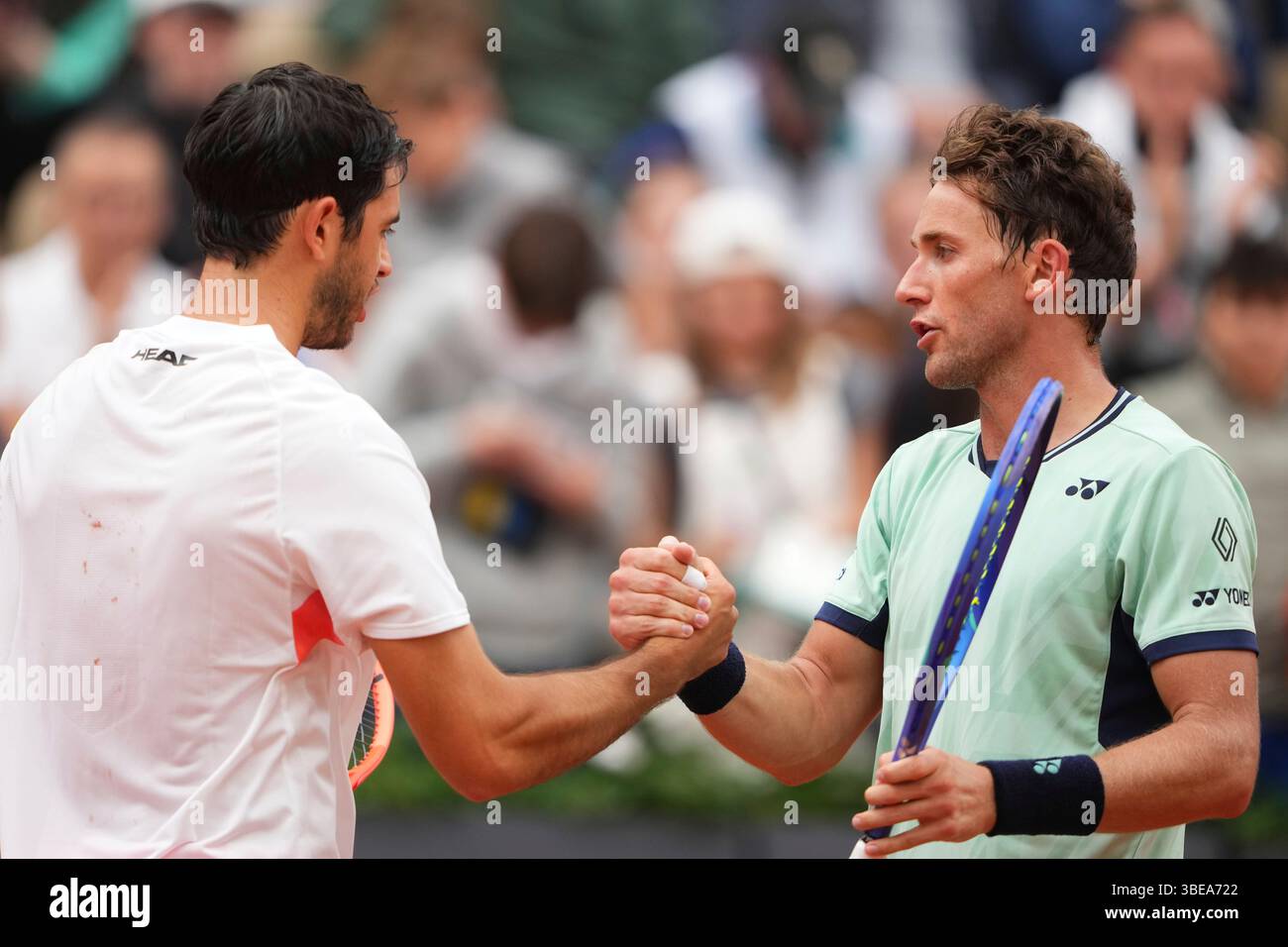 Portugal's Nuno Borges, left, is congratulated by Norway's Casper Ruud after their second round ...