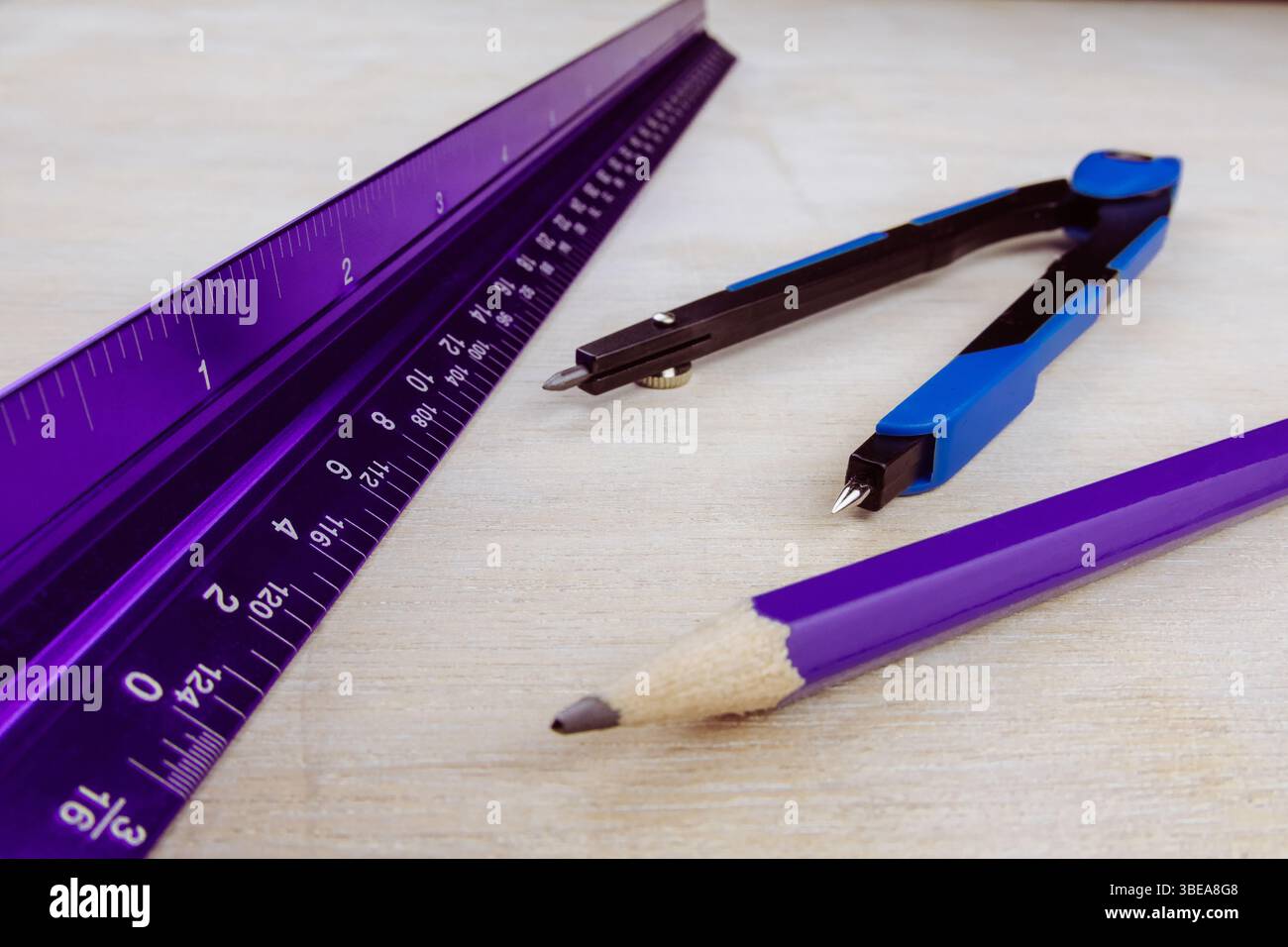 Triangle ruler compass and pencil Lets do some work Stock Photo - Alamy