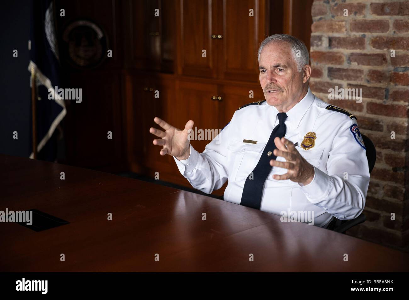 Outgoing U.S. Capitol Police Chief J. Thomas Manger gives an interview ...