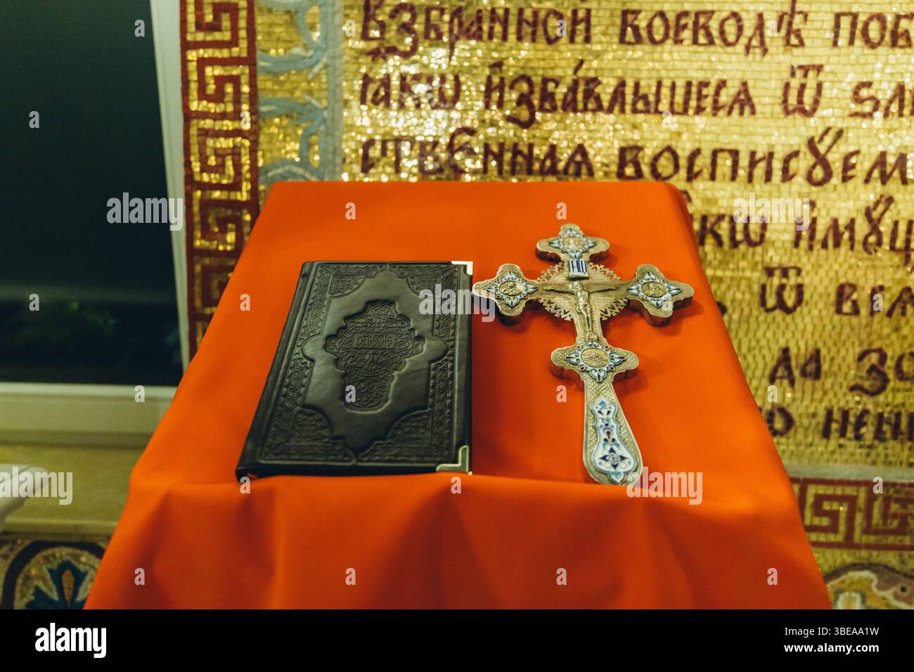 Church paraphernalia cross and gospel Stock Photo - Alamy