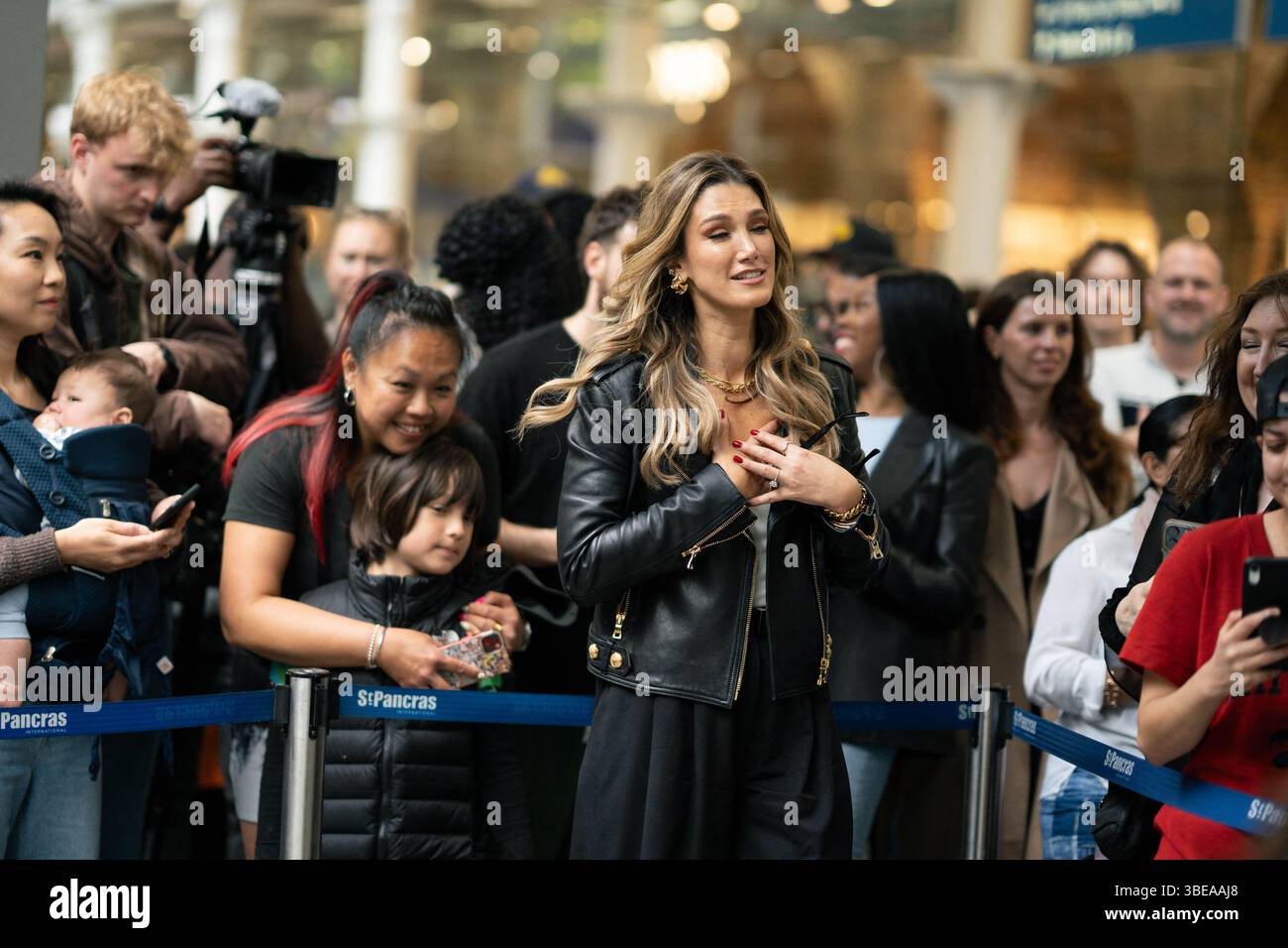 Delta Goodrem performs on the Sir Elton John piano at St Pancras ...
