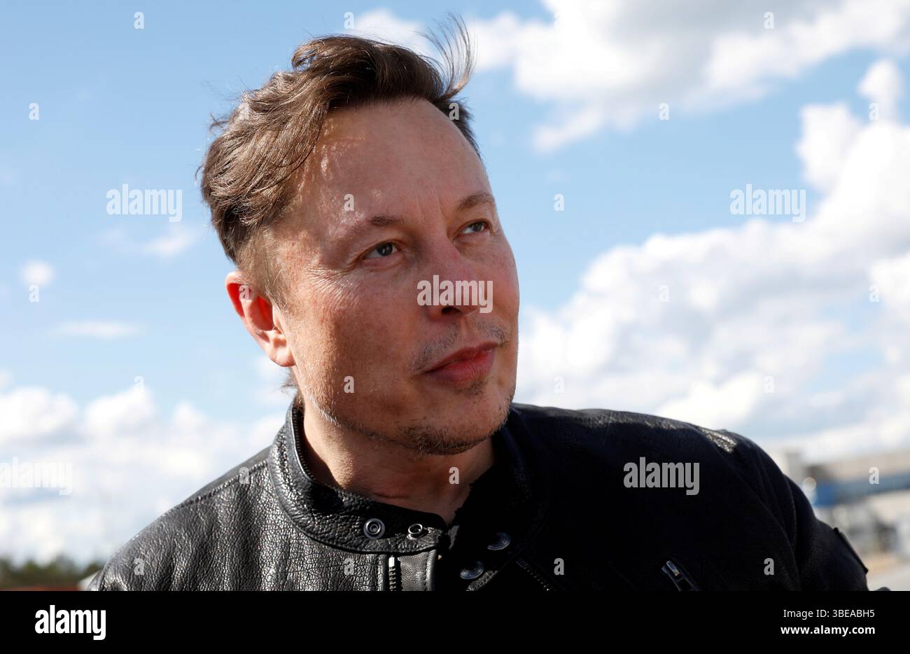 SpaceX founder and Tesla CEO Elon Musk looks on as he visits the ...