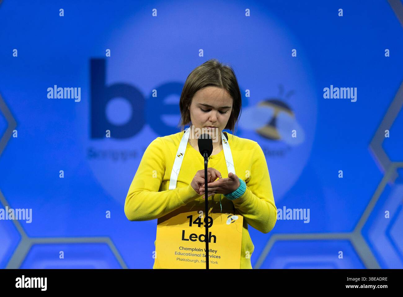 Leah Marie Rini, 13, of Plattsburgh, N.Y., spells her word as she ...