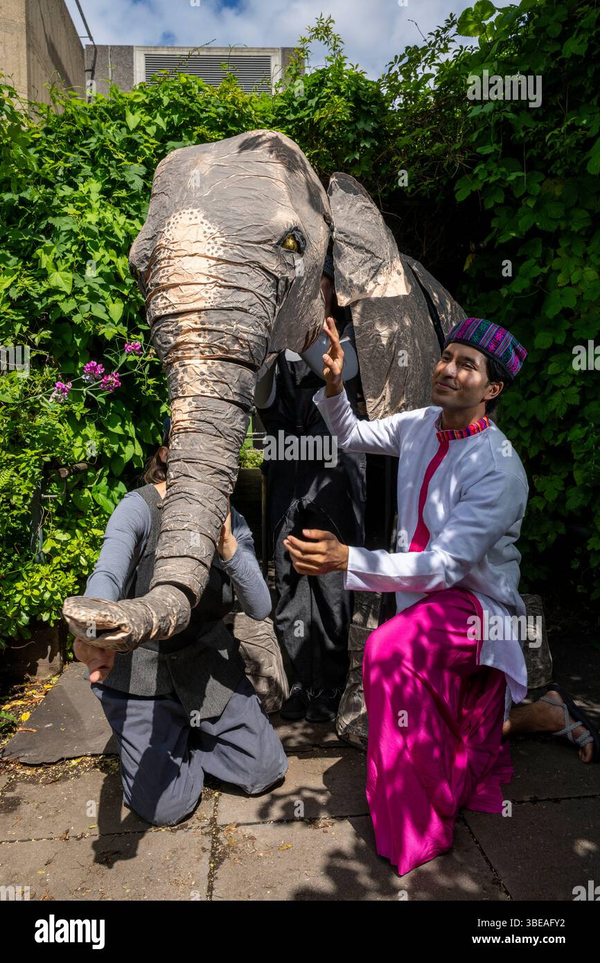 London, UK. 28 May 2025. Adi Chugh as Opu interacts with teenage elephant Janu (controlled by ...