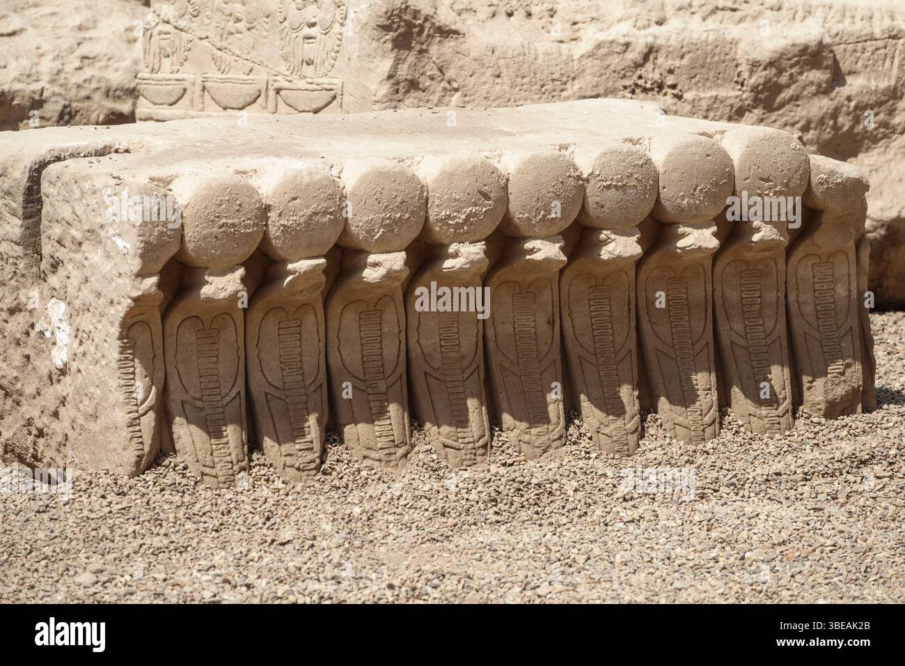 Close up of broken statues and relief work on blocks at Denderah Temple ...