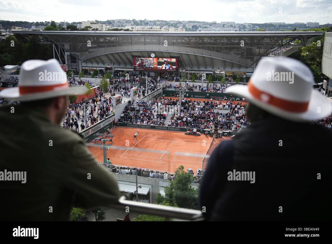 Spectators enjoy second round matches of the French Tennis Open, at the ...