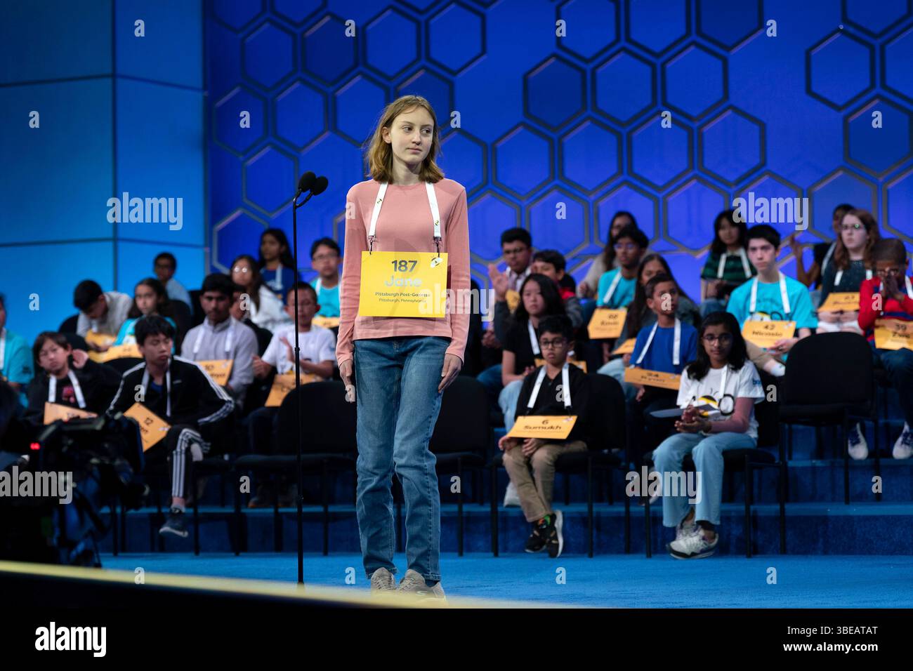 Jane Ross, 14, of Pittsburgh, Pa.,, spells her word as she competes ...
