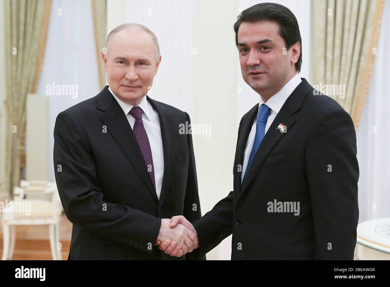 Russian President Vladimir Putin, left, and the Chairman of the ...