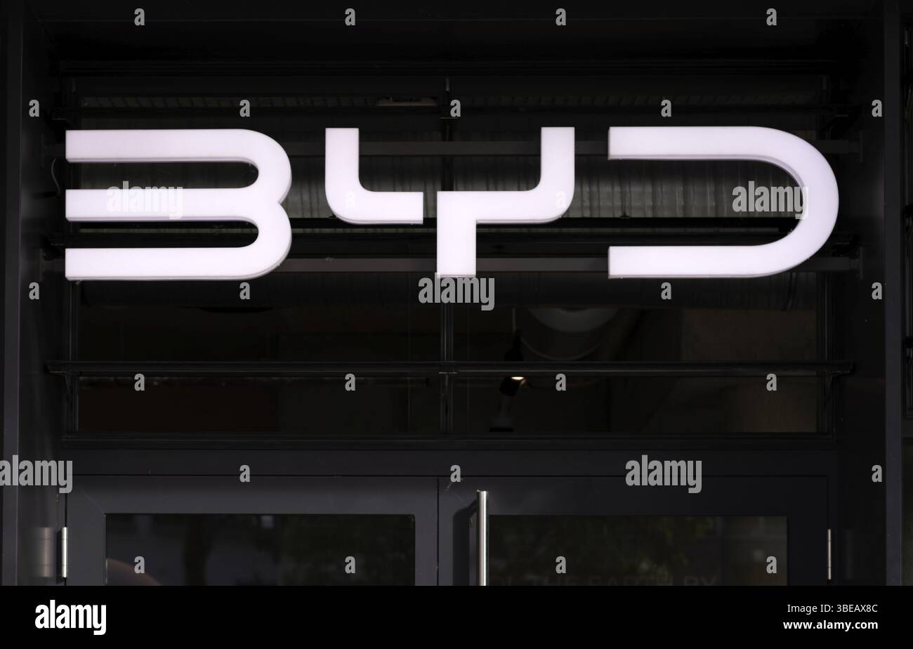 Logo in front of showroom, sales exhibition of the car brand BYD Build ...