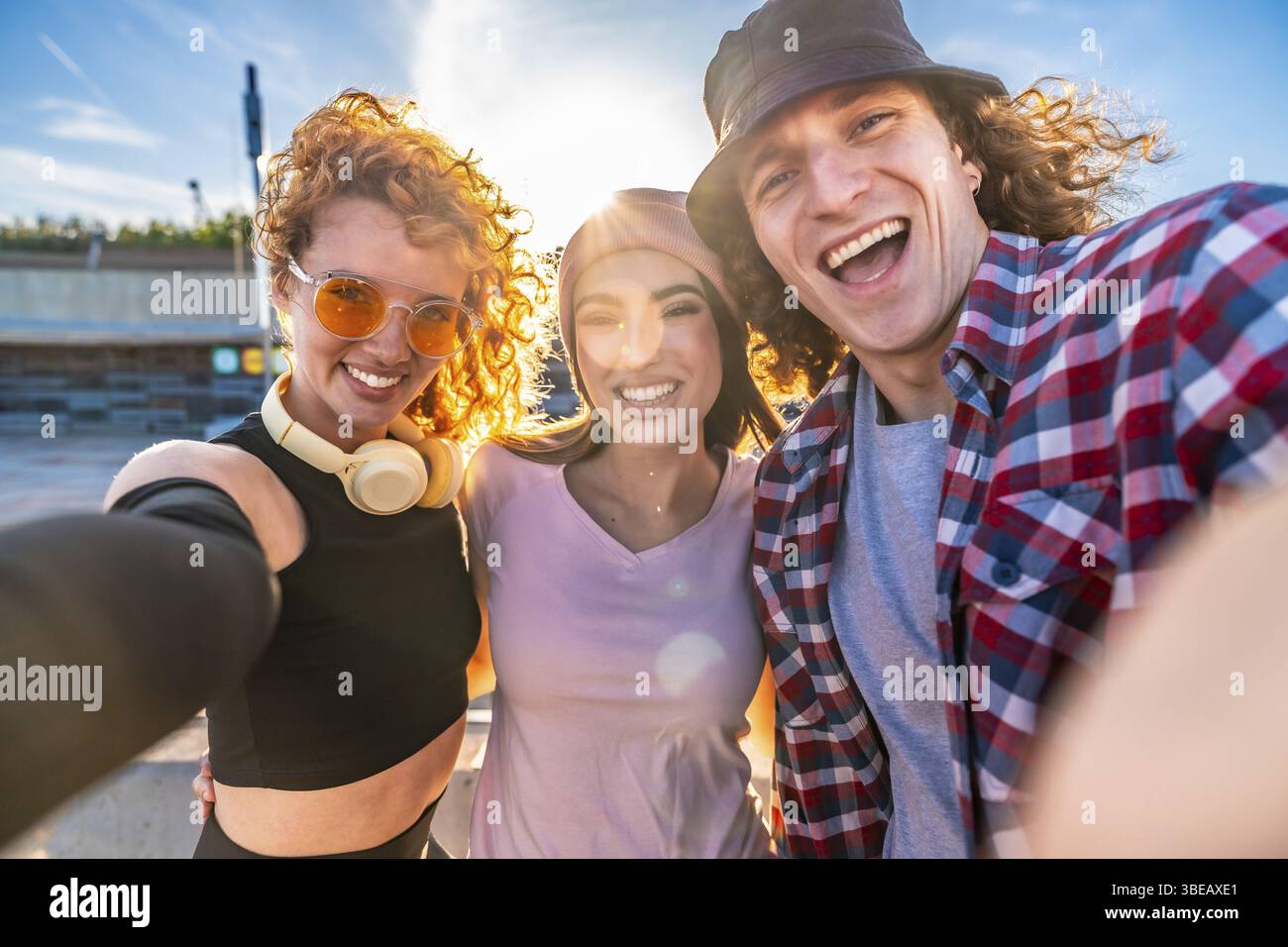 Young friends capturing moment camaraderie hi-res stock photography and ...