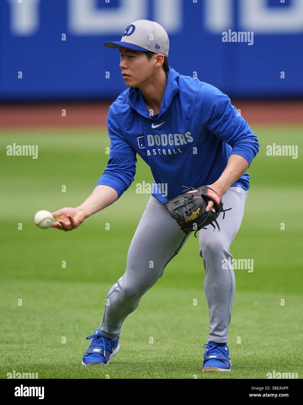 Los Angeles Dodgers' Hyeseong Kim, of Korea, before a baseball game ...