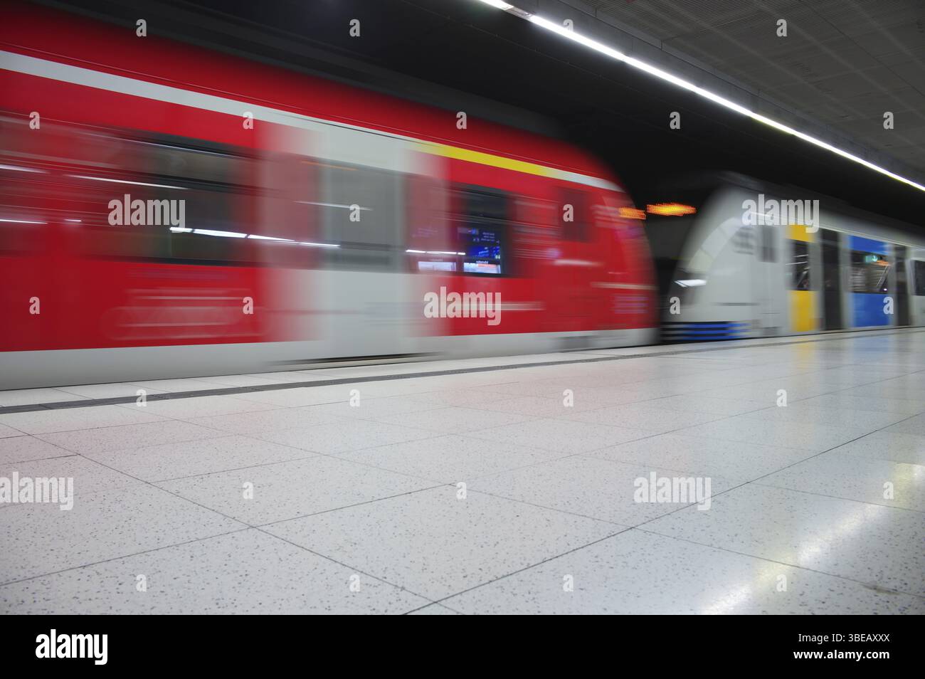 Underground arriving S-Bahn, train, class 420 in traffic red, coupled ...