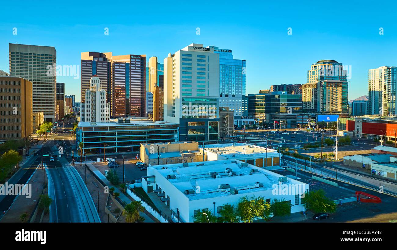 Aerial Downtown Phoenix Skyline Modern High Rises and Light Rail Golden ...