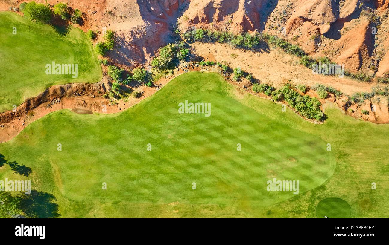 Aerial Golf Course Greens Meeting Desert Terrain Top Down Flyover Stock ...