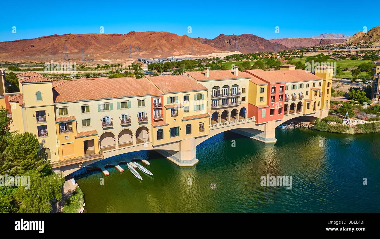 Aerial Mediterranean Style Bridge Over Emerald Lake with Desert ...