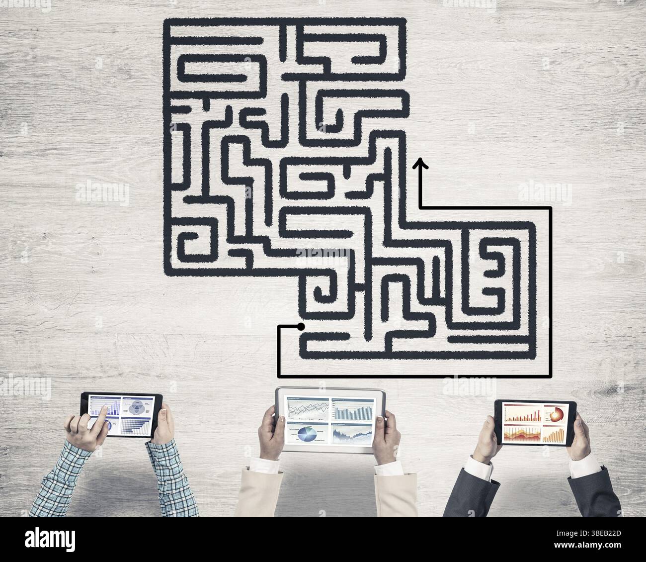 Group of people with devices in hands working together to find right ...