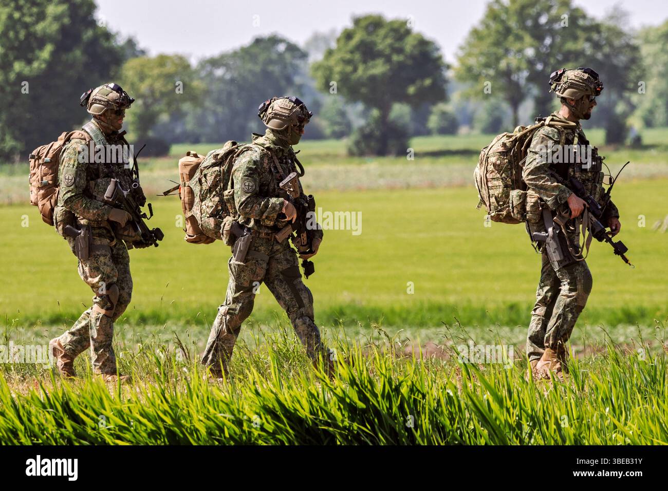 NATO troops walking to an extraction point during military exercise ...
