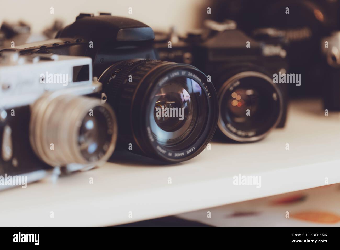 Collection of Both Vintage and Modern Cameras Stock Photo - Alamy