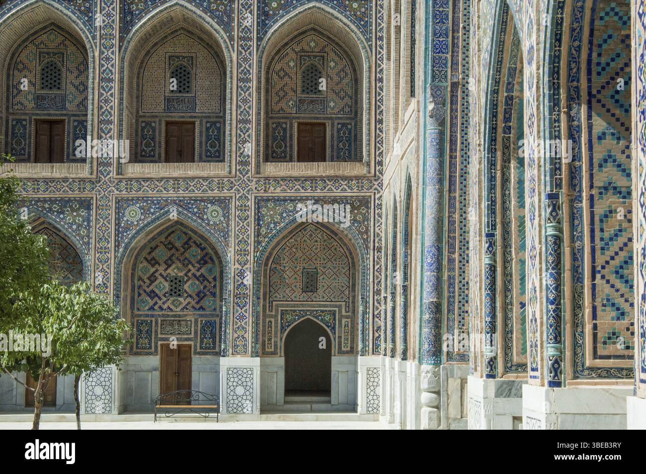 The arch and the exterior design of the ancient Registan in Samarkand ...