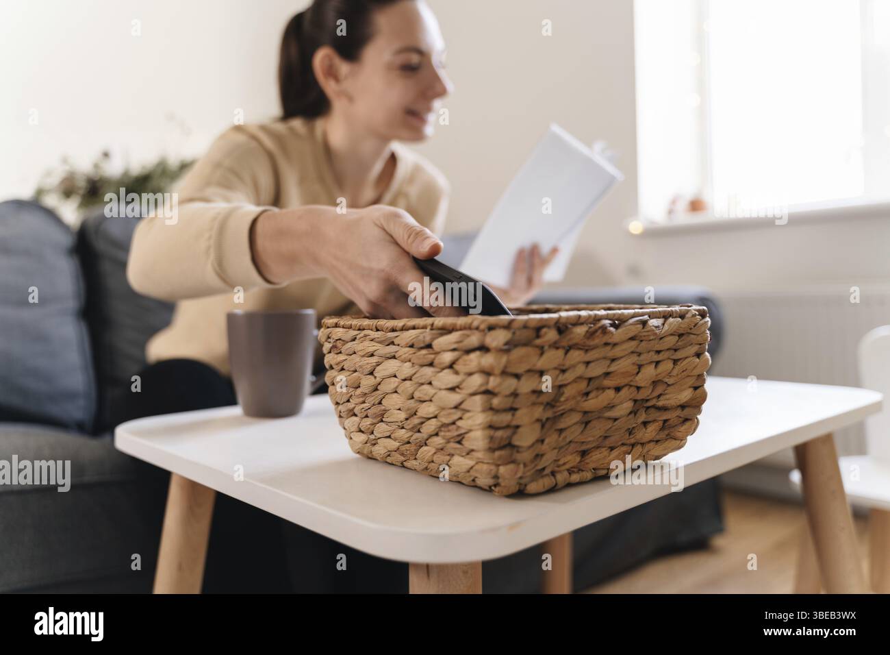 Millennial girl at home refuse using phone and reading a book. Social ...