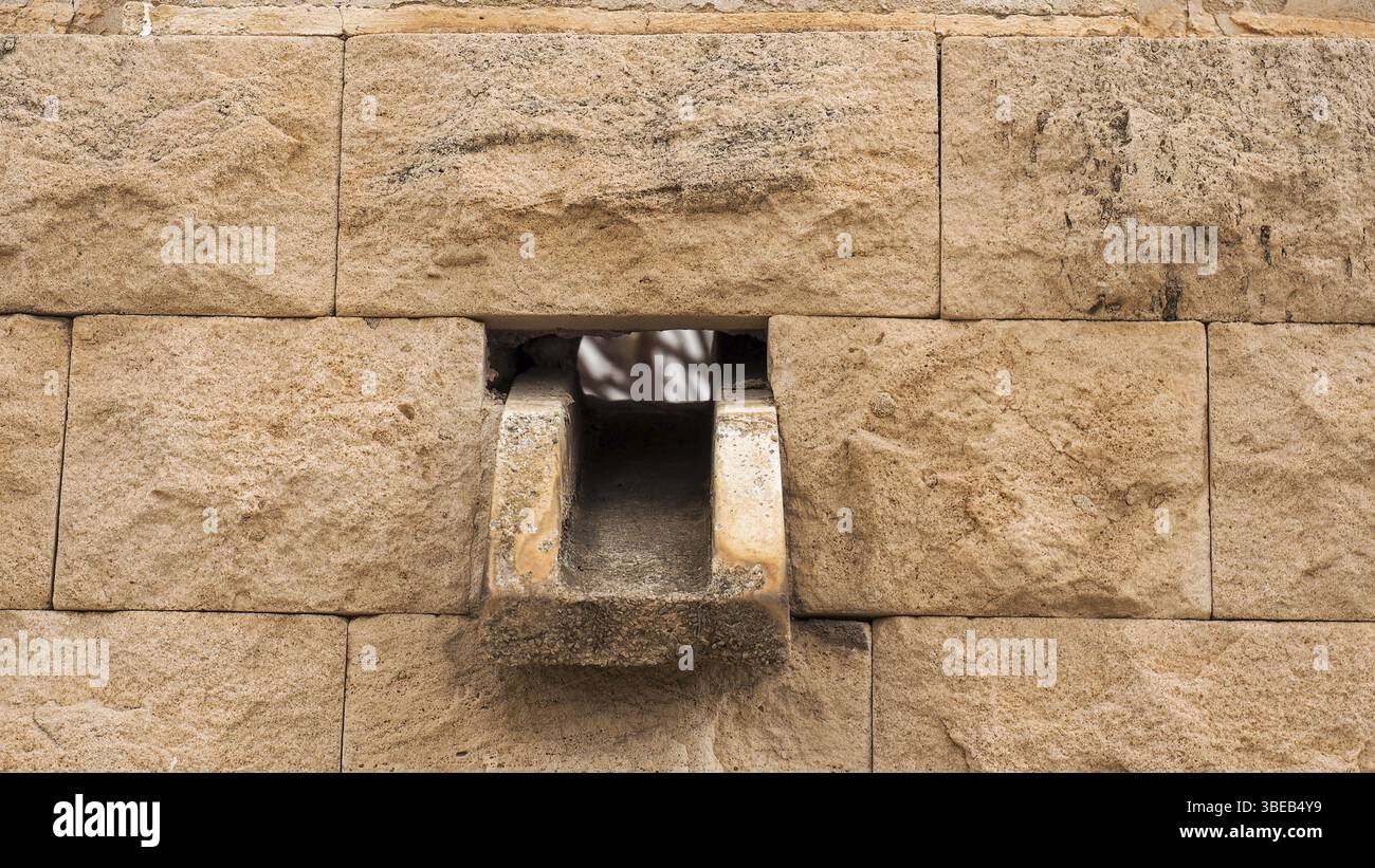 Drainage in limestone wall, Majorca Stock Photo - Alamy