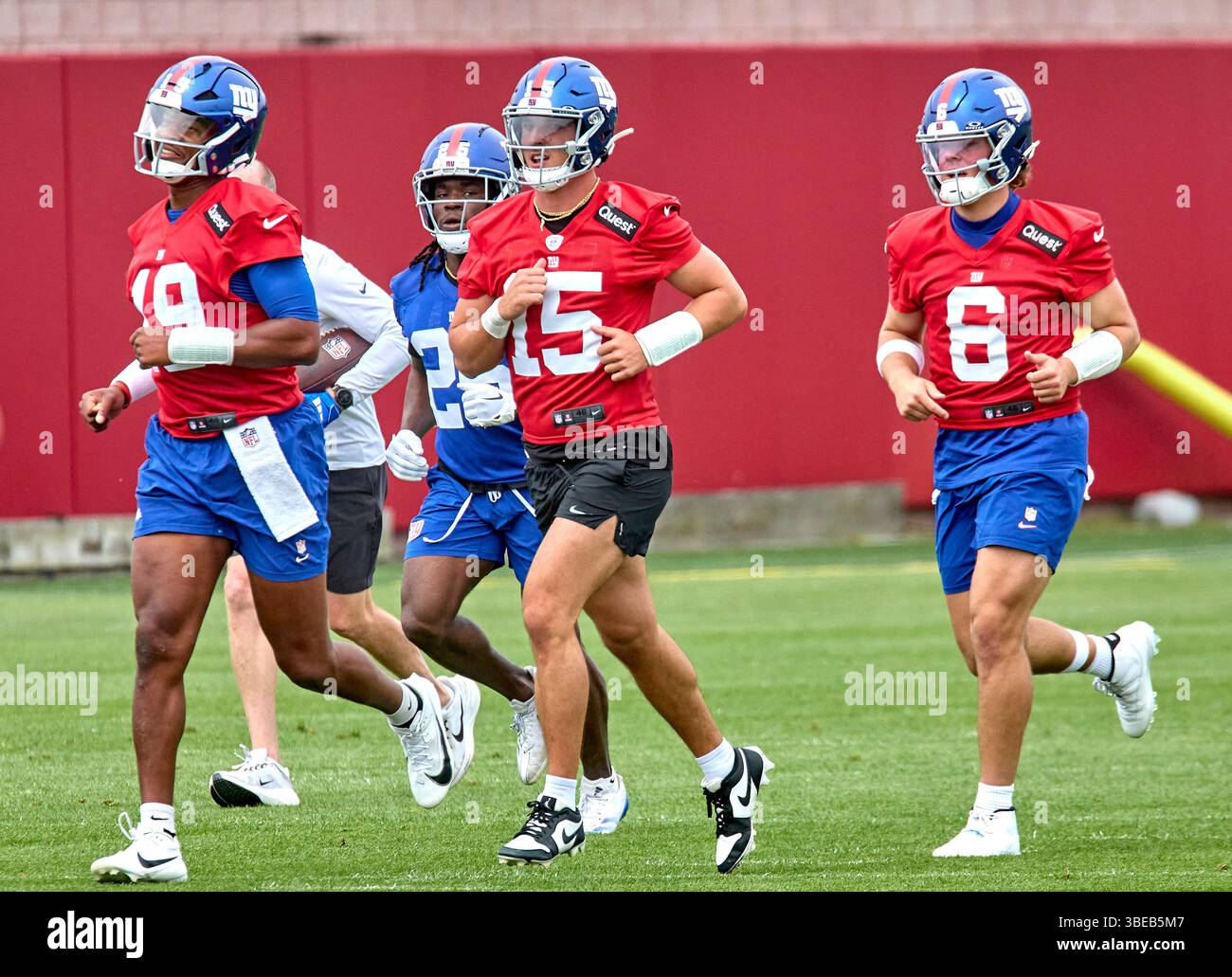 New York Giants quarterbacks Jameis Winston (19), Tommy DeVito (15) and ...