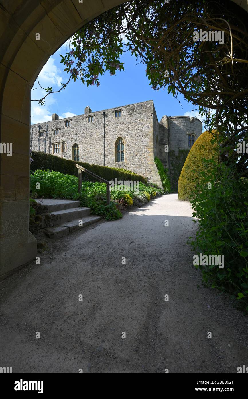 View through an arched gateway of Chirk Castle and Garden, showing ...