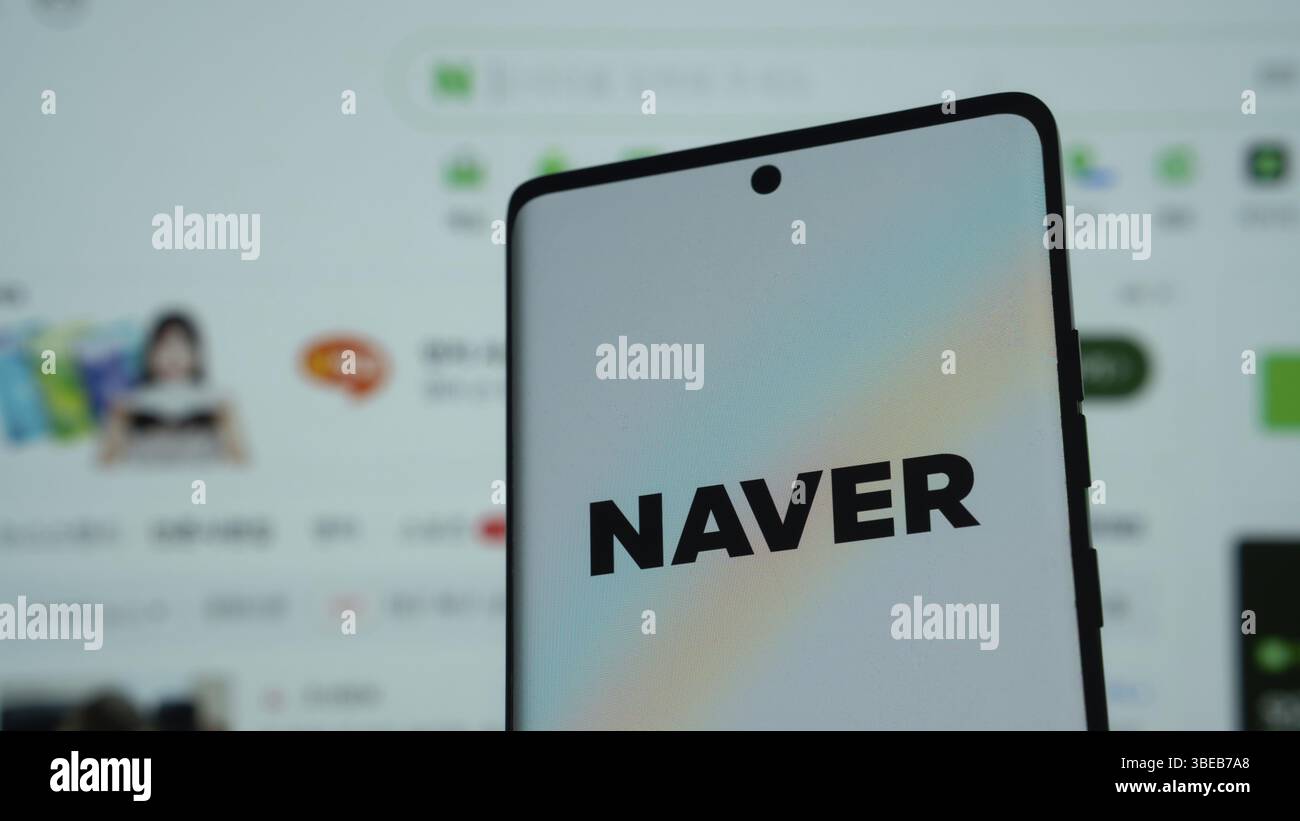 Smartphone displaying Naver logo against a blurred tech-themed ...