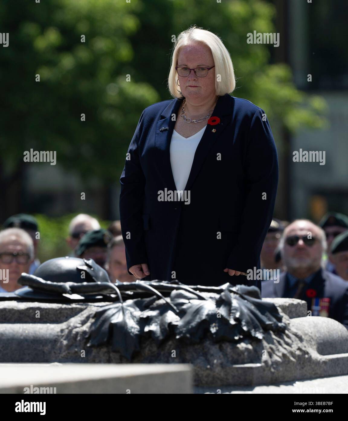 Veterans Affairs Minister Jill McKnight pays her respects during a ...