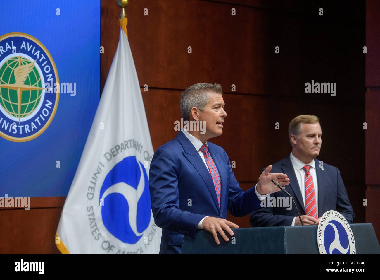 Acting FAA Administrator Chris Rocheleau, right, listens as Secretary ...