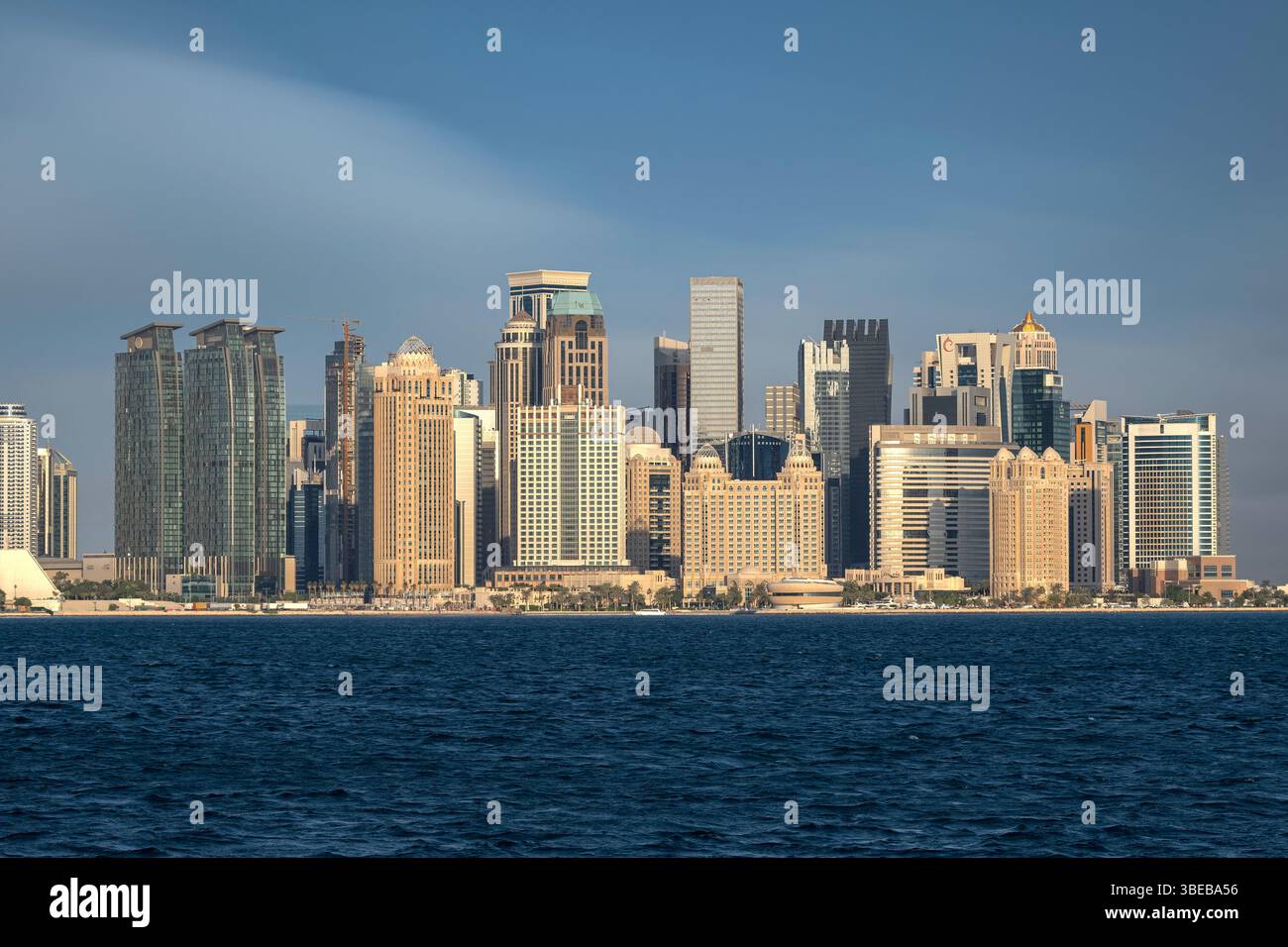 The Panoramic skyline of Doha, Qatar during sunrise Doha Qatar Stock ...