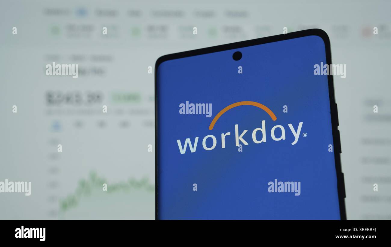 Close-up of Workday logo on a smartphone with a blue background and ...