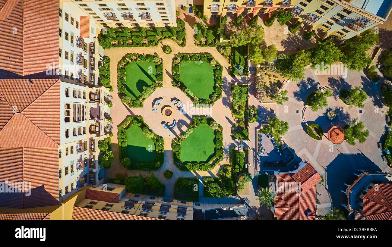 Aerial Mediterranean Courtyard with Fire Pit and Geometric Lawns Top ...