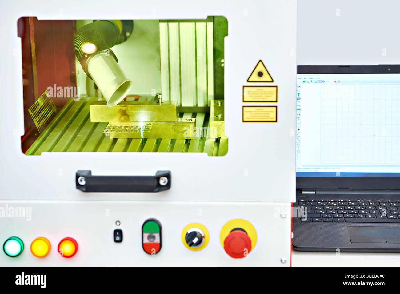 Laser cutting machine for precision with control panel laptop Stock ...