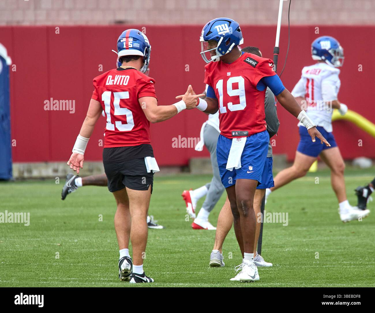 New York Giants quarterbacks Jameis Winston (19) and Tommy DeVito (15 ...